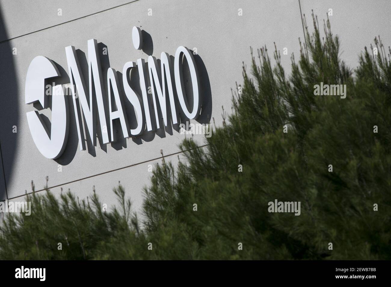 A logo sign outside of the headquarters of Masimo in Irvine, California ...