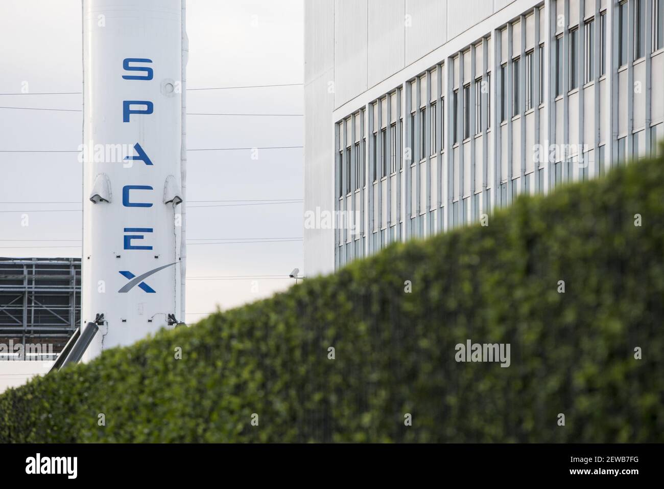 A logo sign outside of the headquarters of Space Exploration Technologies Corp., also known as ...