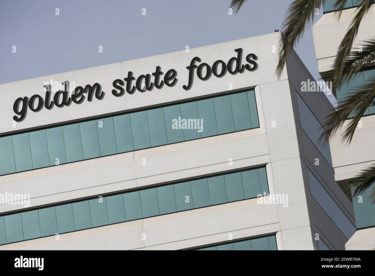 A logo sign outside of the headquarters of Golden State Foods in Irvine ...