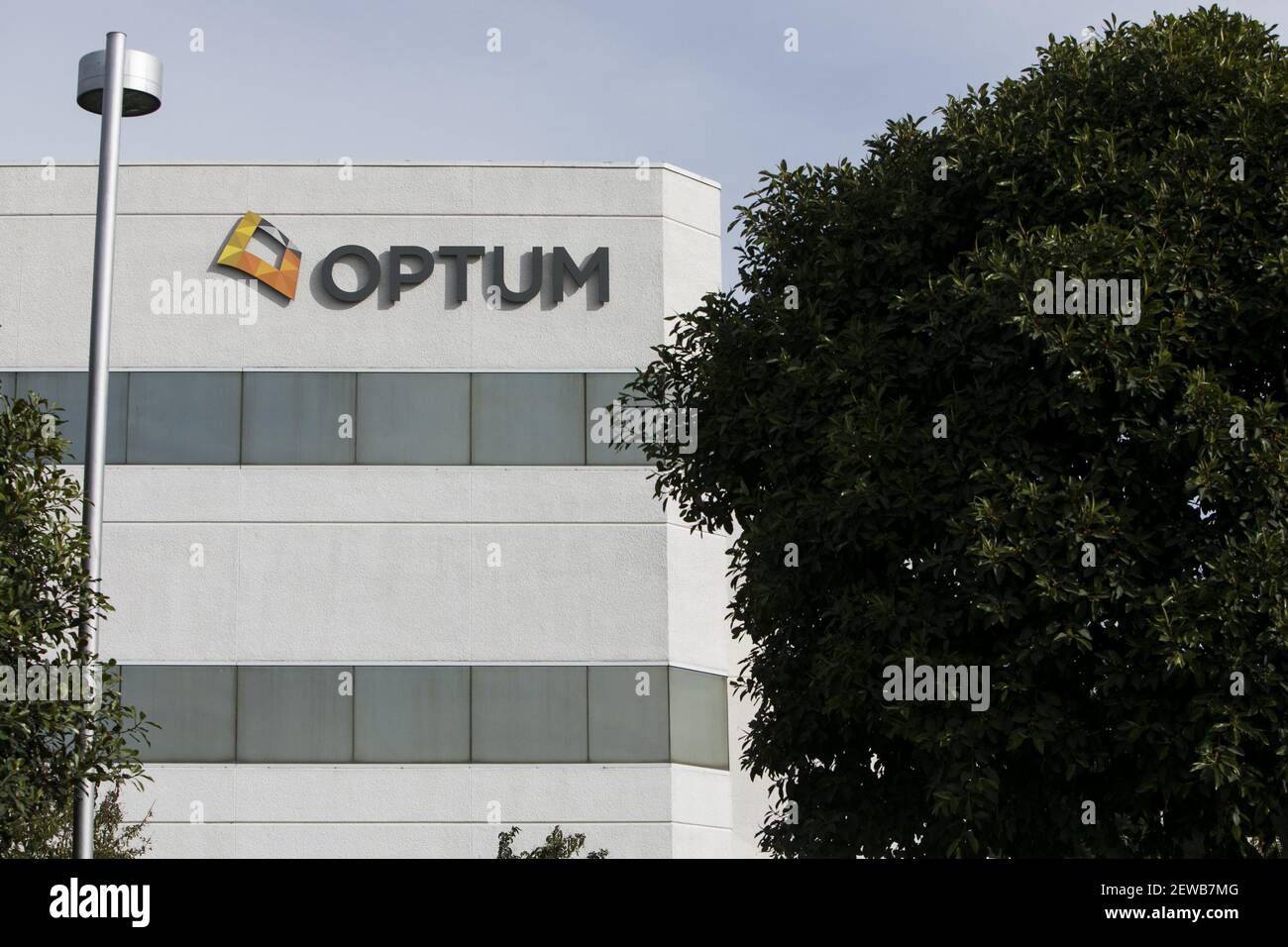 A logo sign outside of a facility occupied by Optum in Irvine ...