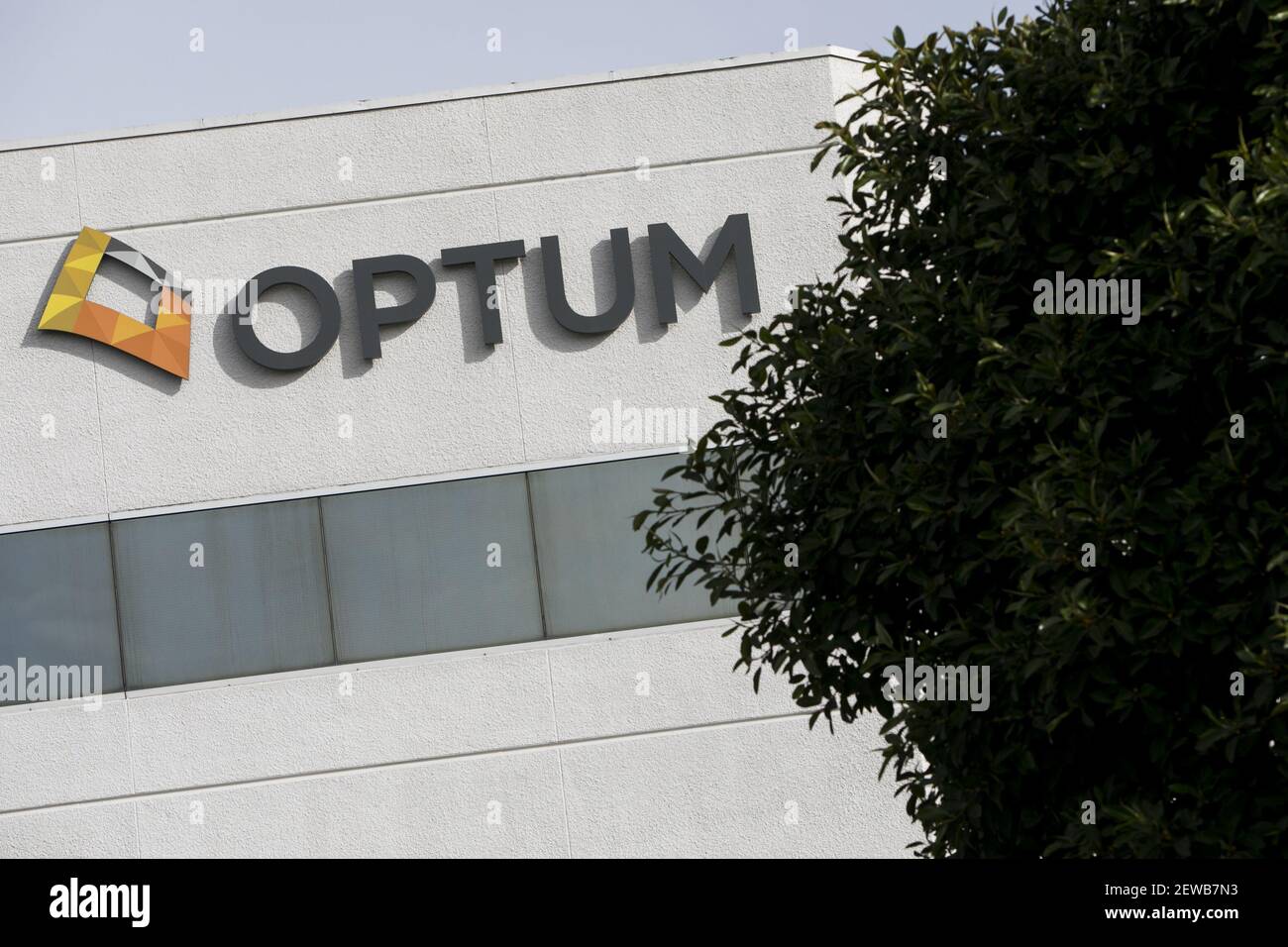 A logo sign outside of a facility occupied by Optum in Irvine ...
