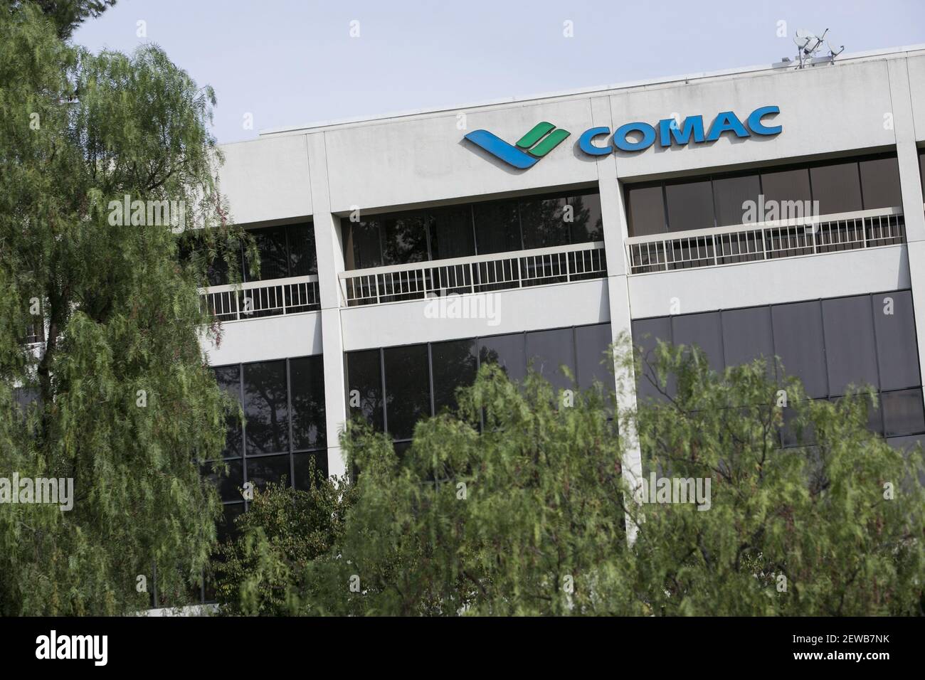 A logo sign outside of a facility occupied by The Commercial Aircraft ...