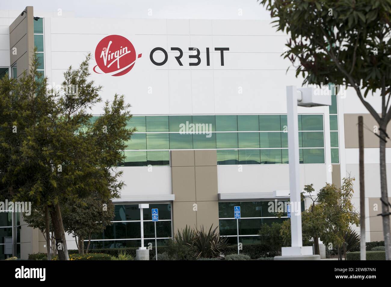 A logo sign outside of the headquarters of Virgin Orbit in Long Beach ...