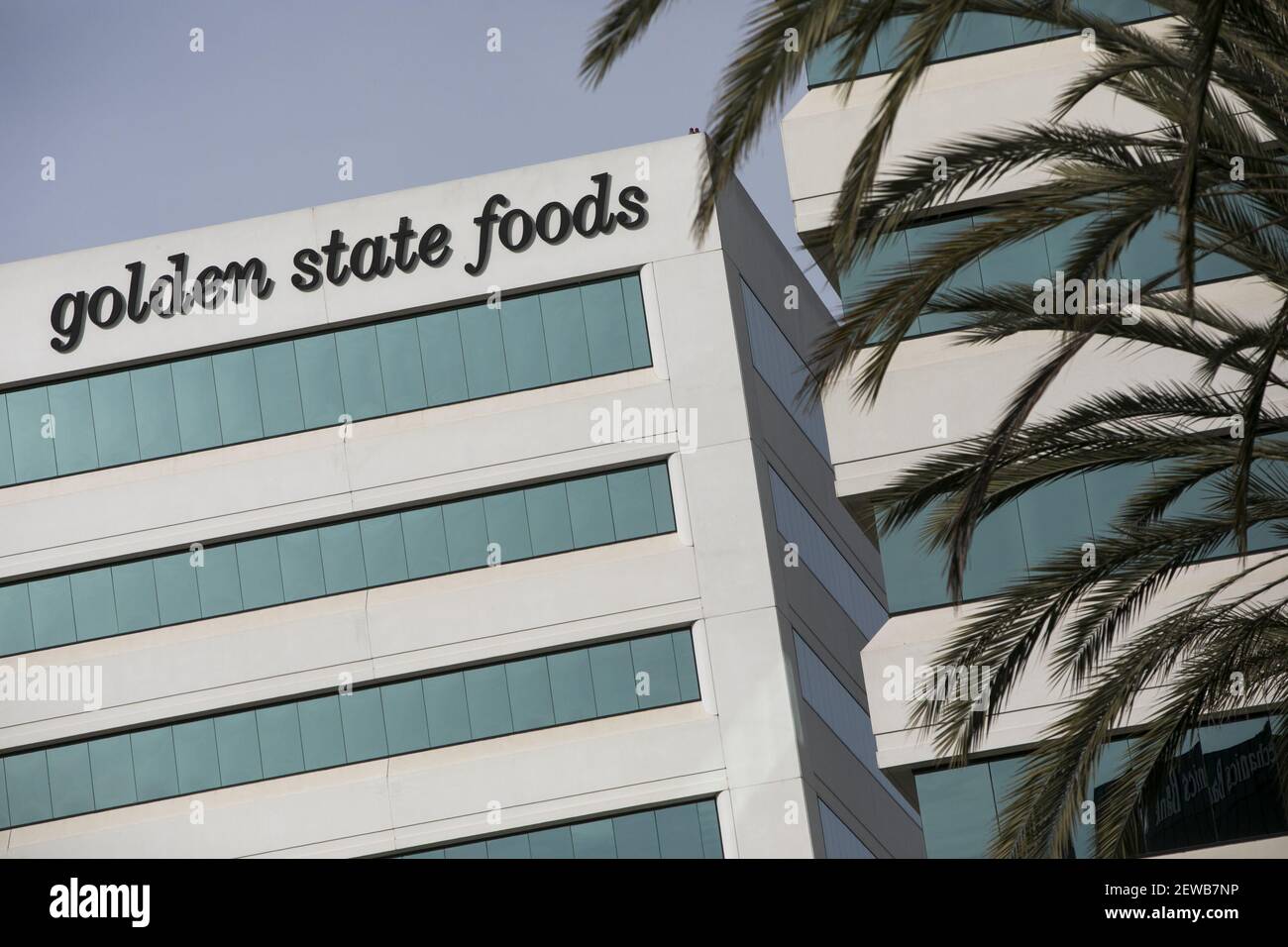 A logo sign outside of the headquarters of Golden State Foods in Irvine ...
