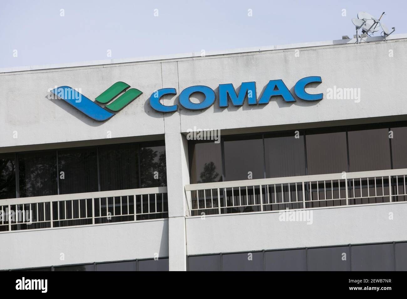 A logo sign outside of a facility occupied by The Commercial Aircraft ...