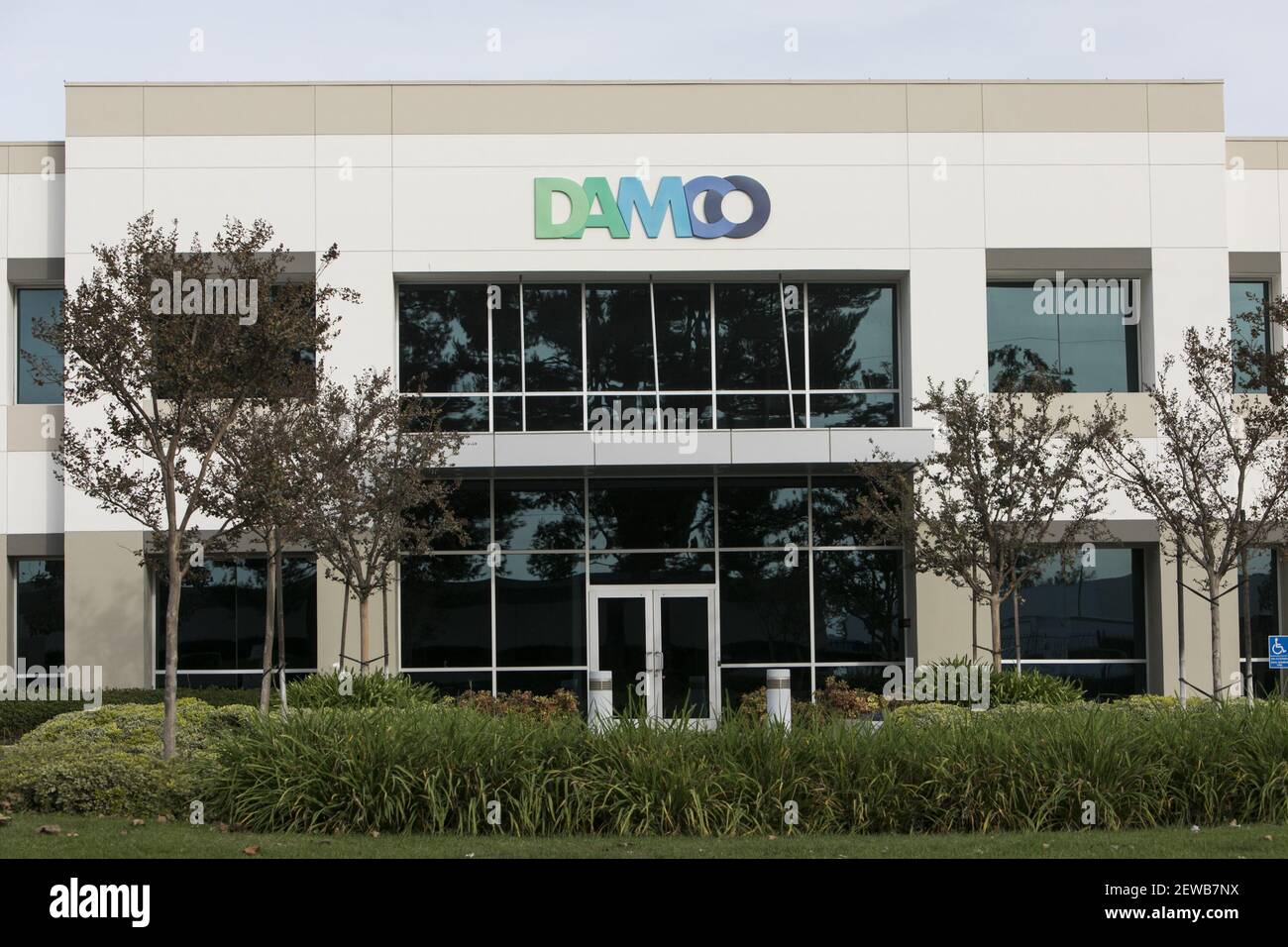 A logo sign outside of a facility occupied by Damco in Carson ...