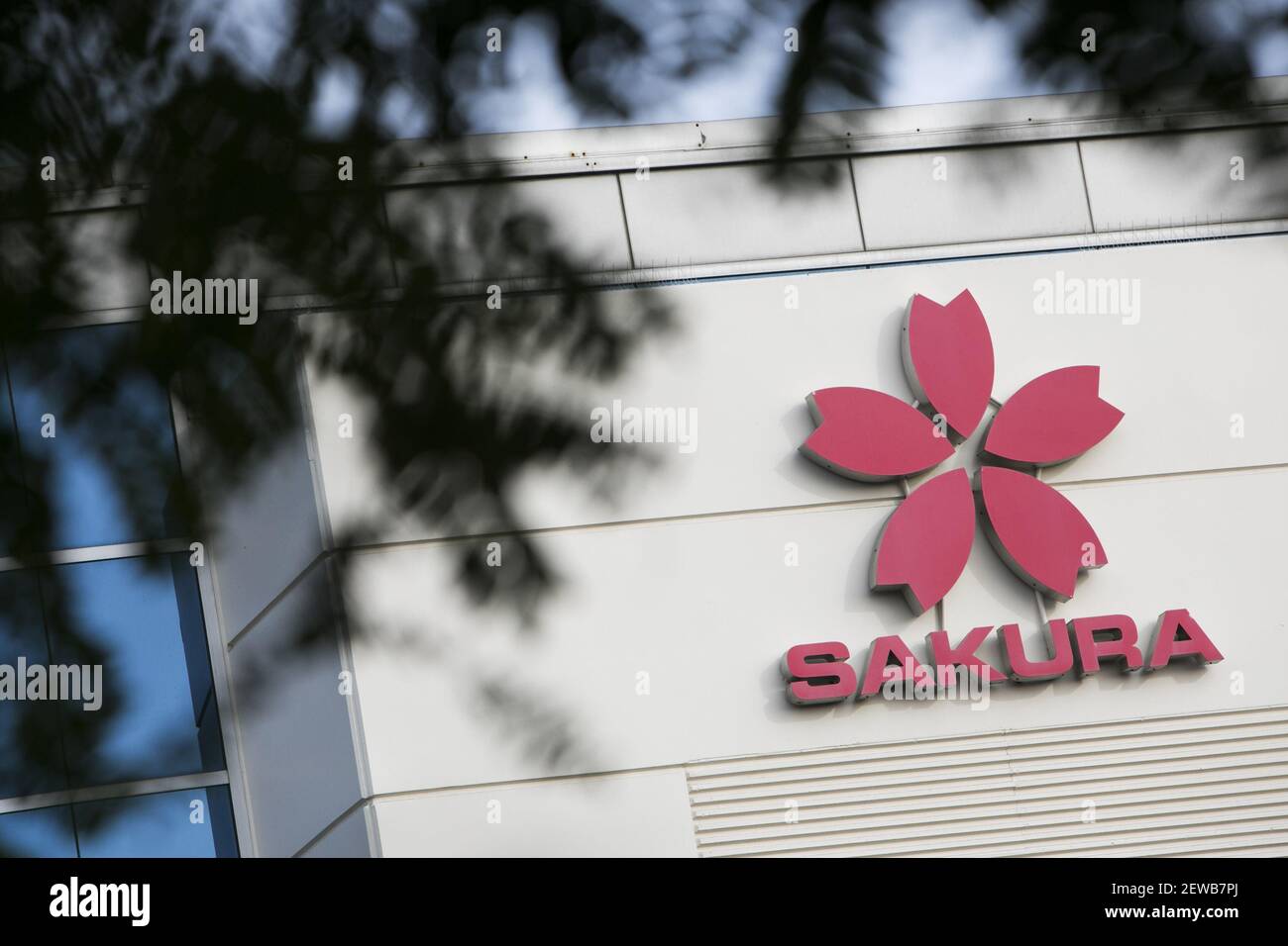 A logo sign outside of a facility occupied by Sakura Finetek in ...