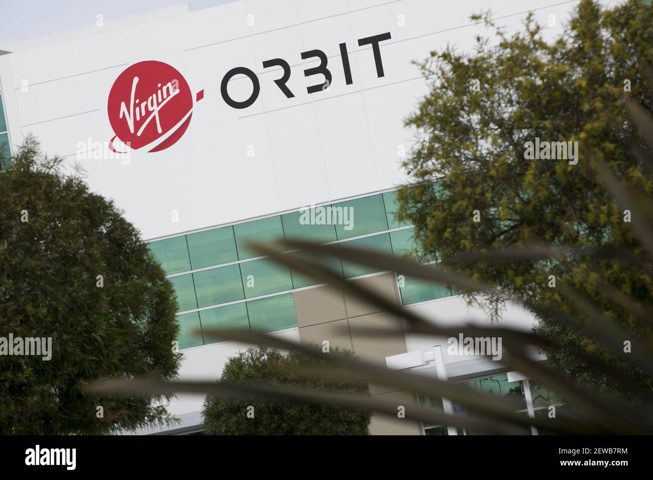 A logo sign outside of the headquarters of Virgin Orbit in Long Beach ...