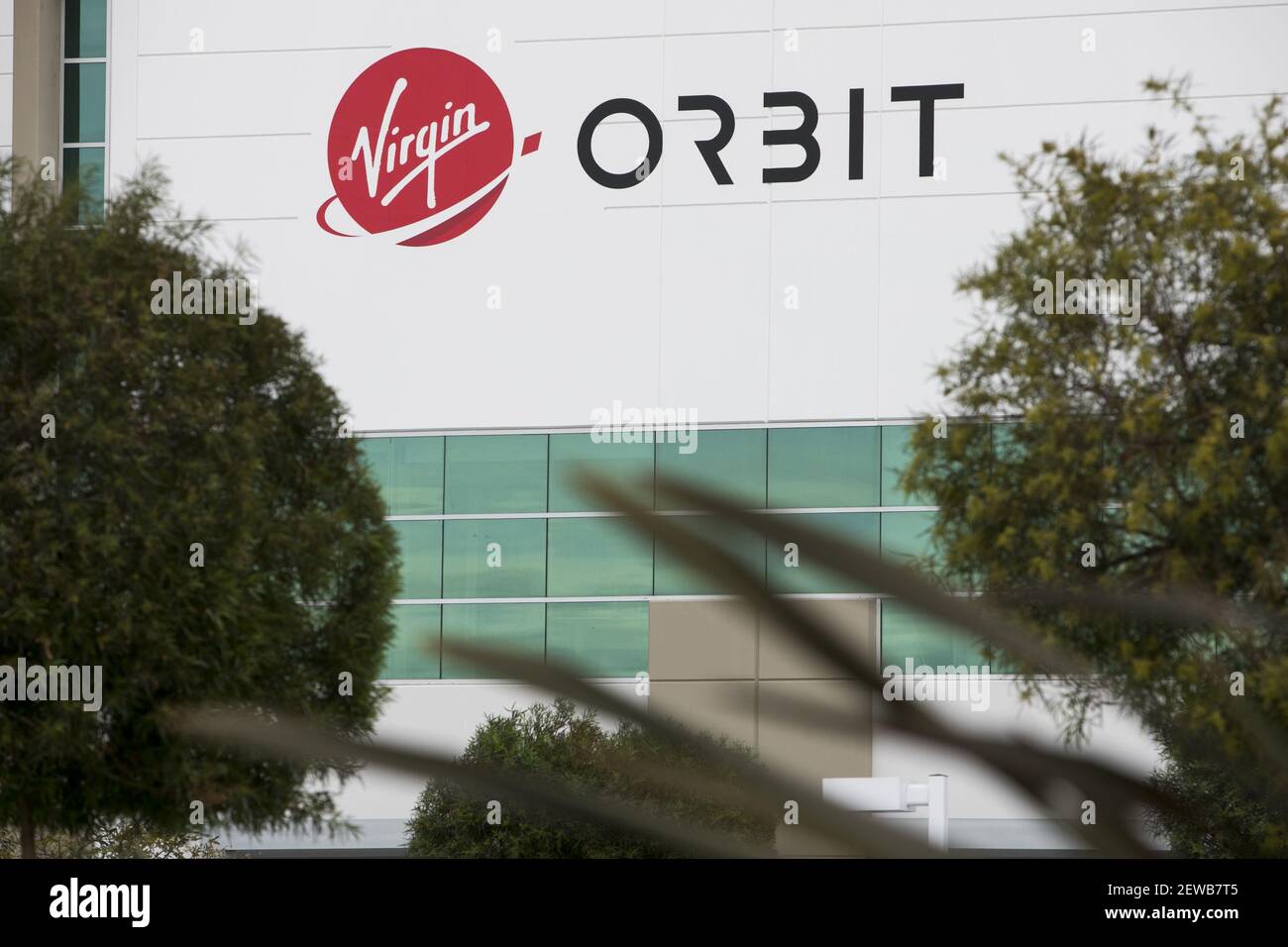 A logo sign outside of the headquarters of Virgin Orbit in Long Beach ...