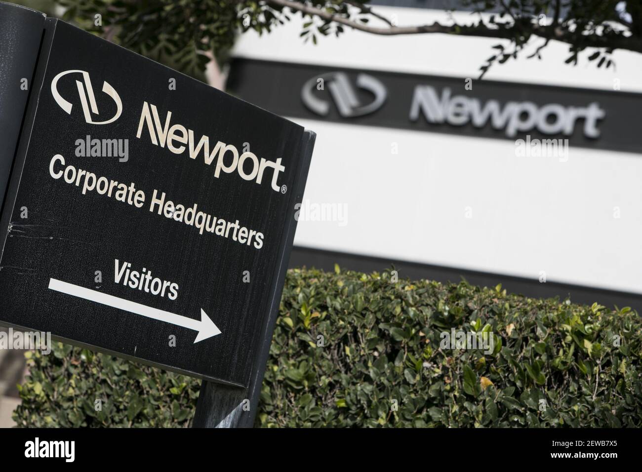 A logo sign outside of the headquarters of the Newport Corporation in ...