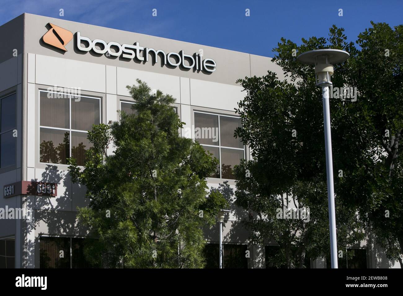 A logo sign outside of the headquarters of Boost Worldwide, Inc., in ...