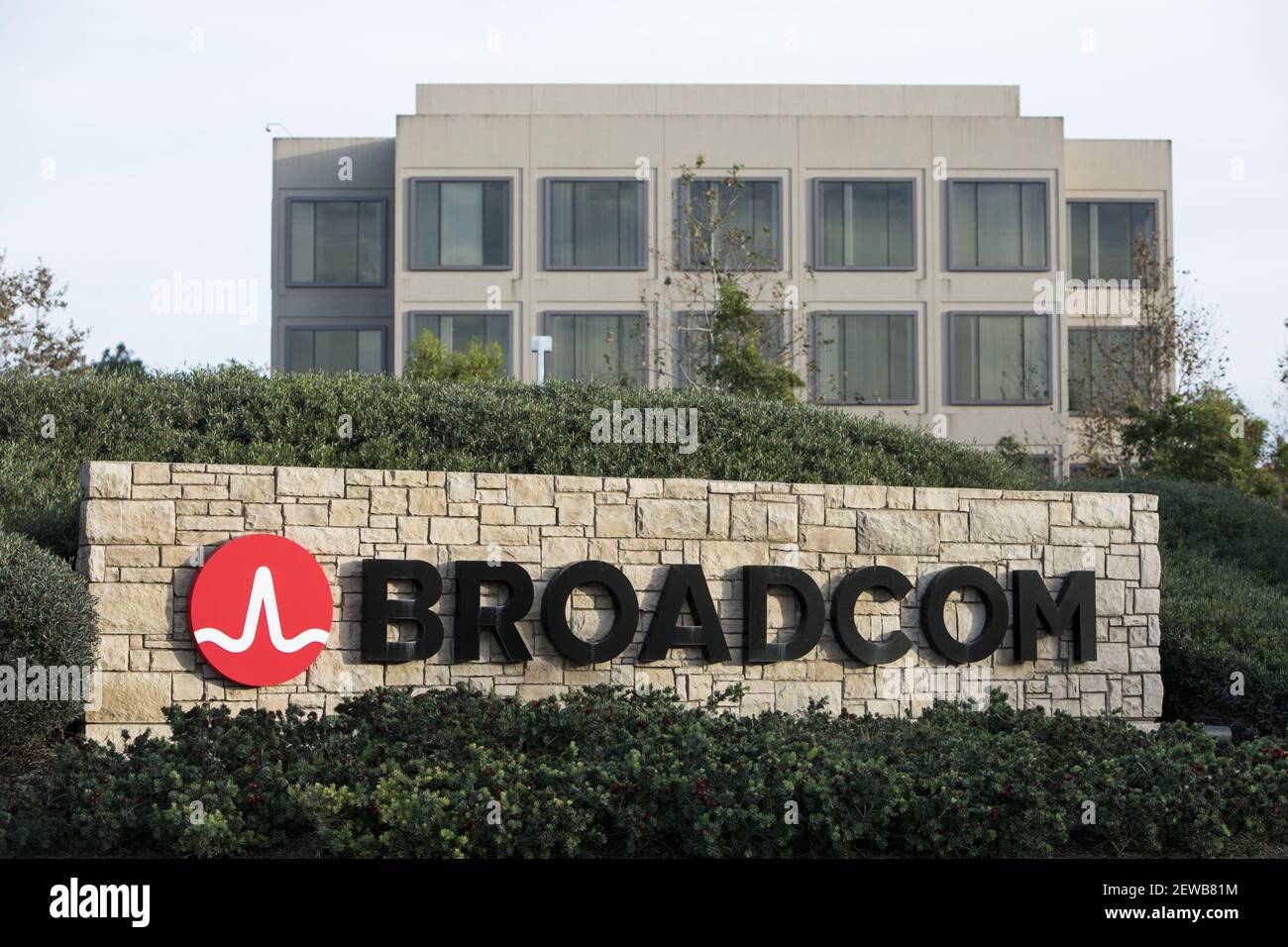 A logo sign outside of the headquarters of the Broadcom Corporation in ...