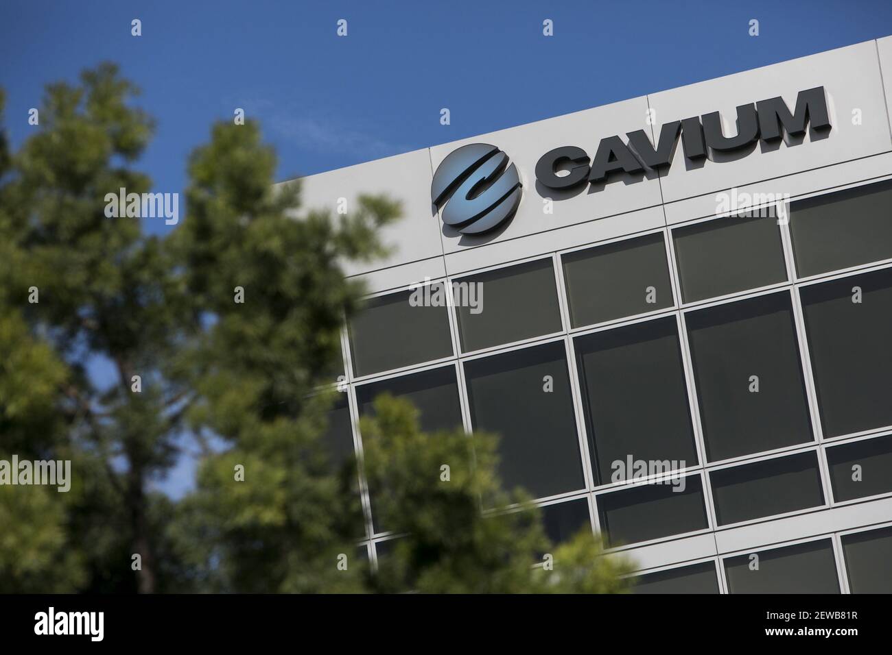 A logo sign outside of a facility occupied by Cavium in Irvine ...