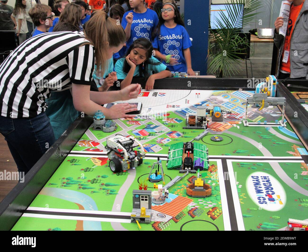 Robots made from Legos race around a game board during Naperville North ...