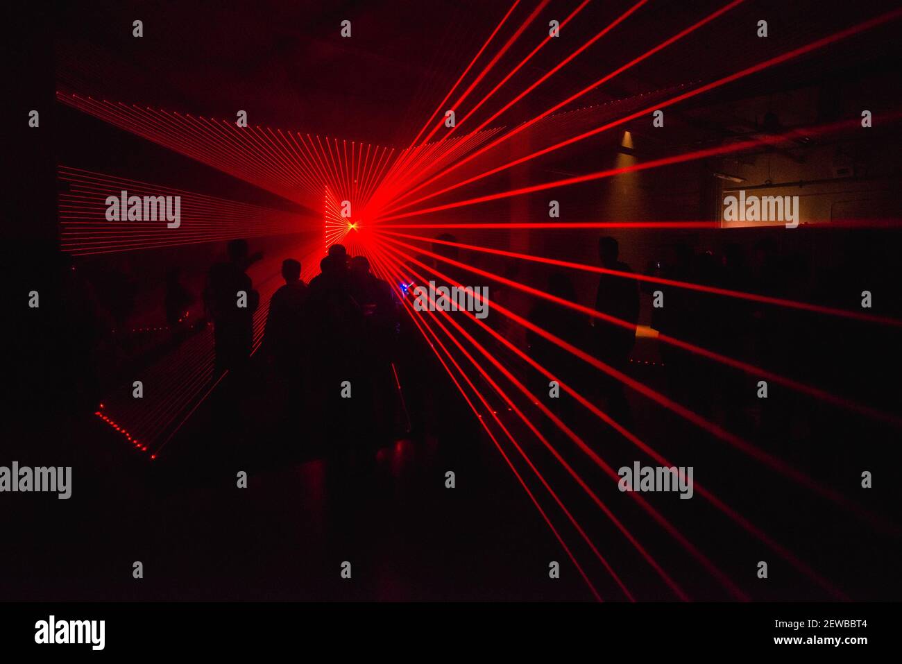 AUSTIN, TX - DECEMBER 16 : Attendees enjoy a light installation by ...