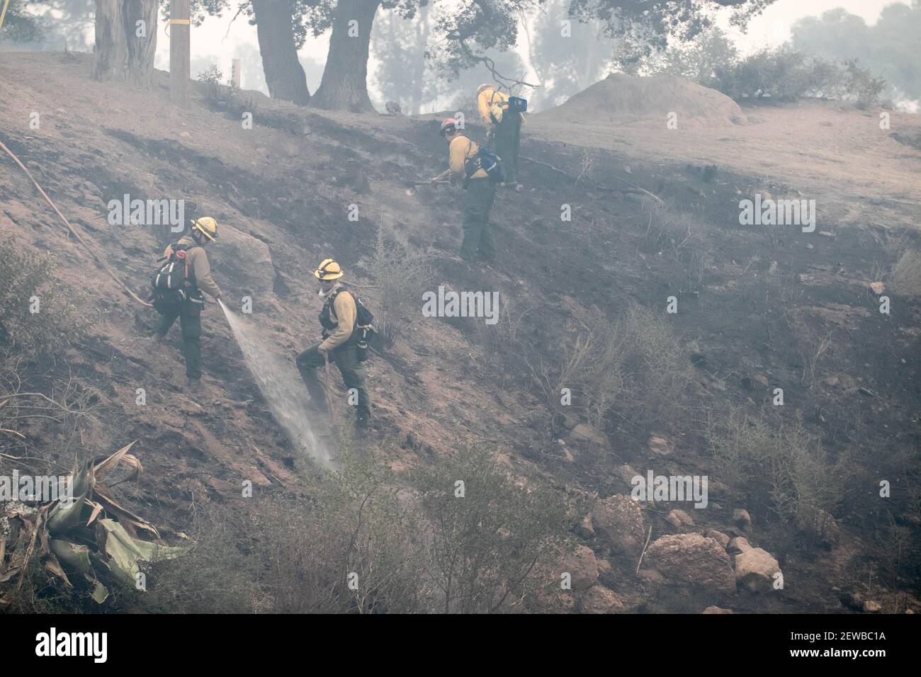 Firefighters extinguish Thomas Fire hotspots in the hills above ...