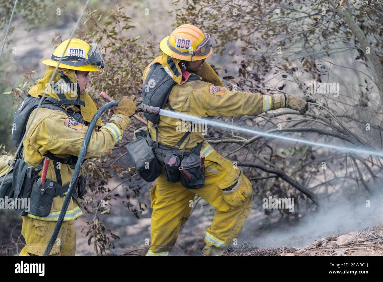Firefighters extinguish Thomas Fire hotspots in the hills above ...