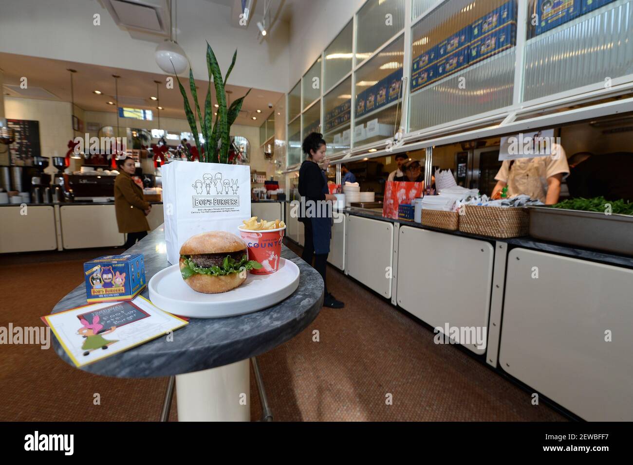 Chef Alvin Cailan's "Foot Feta-ish" burger, inspired by the animated TV show Bob's Burger at the ...