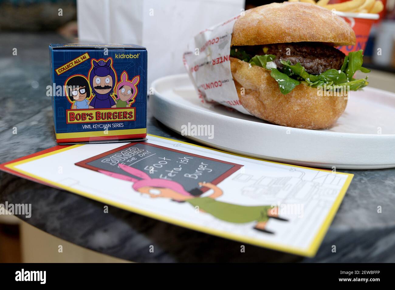 Chef Alvin Cailan's "Foot Feta-ish" burger, inspired by the animated TV show Bob's Burger at the ...