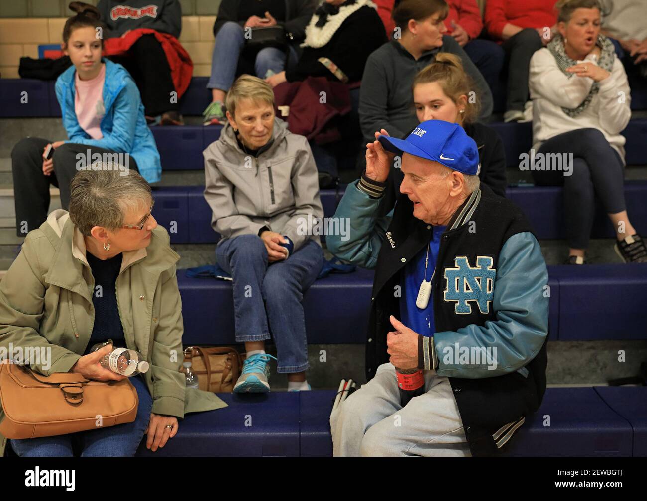 Kathy Donovan talks with Charles Tabor during halftime on Tuesday, Dec ...