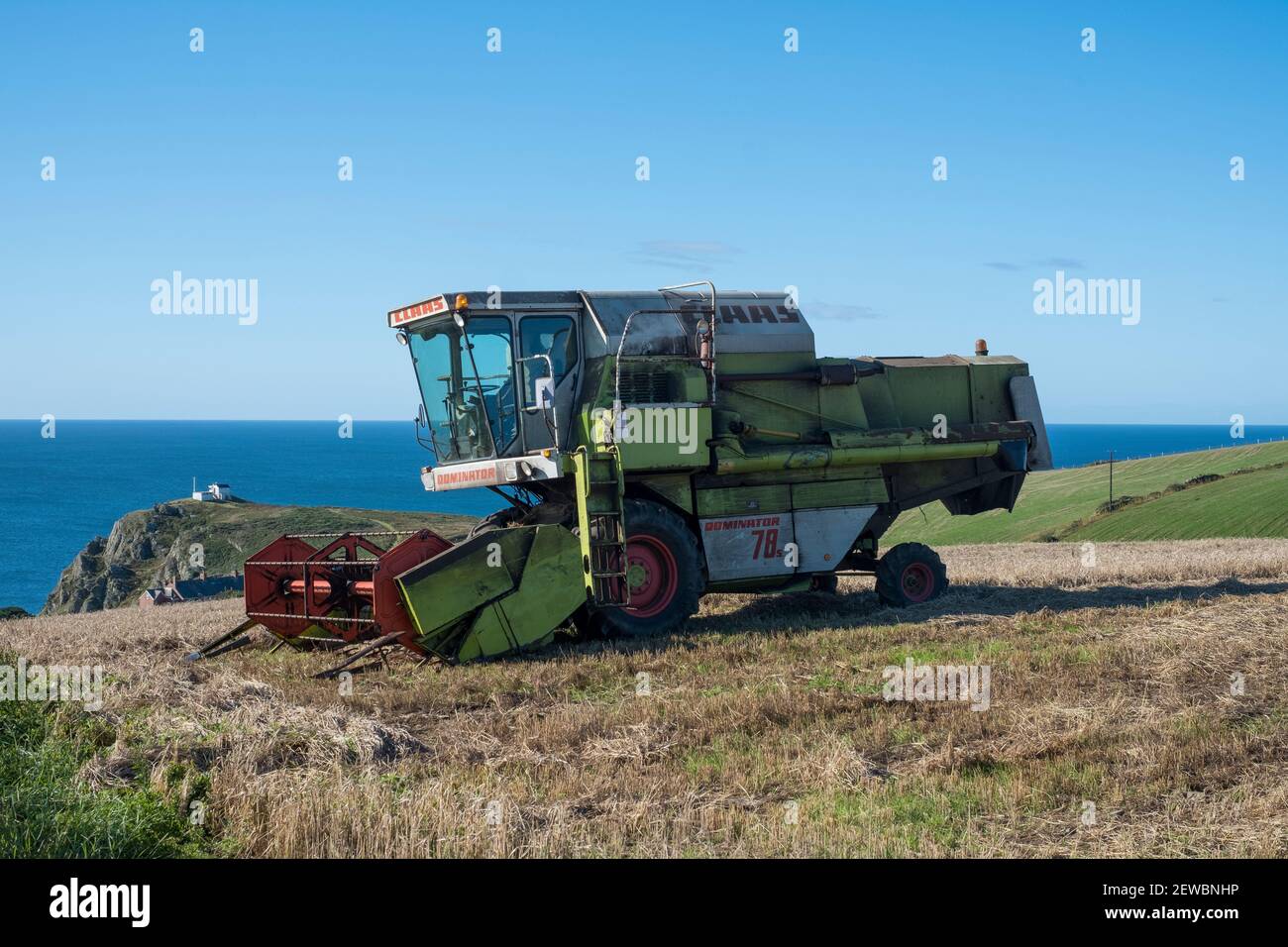 Claas Dominator combine harvester on Barley field, autumn, East Prawle ...
