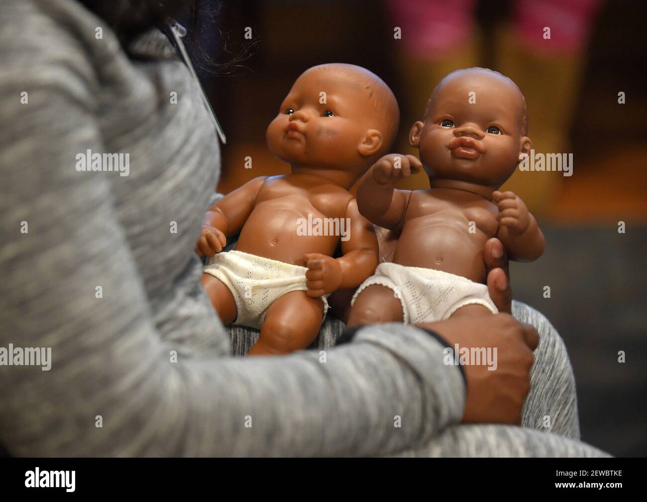 The Mother Goose on the Loose Goslings program uses dolls while the ...