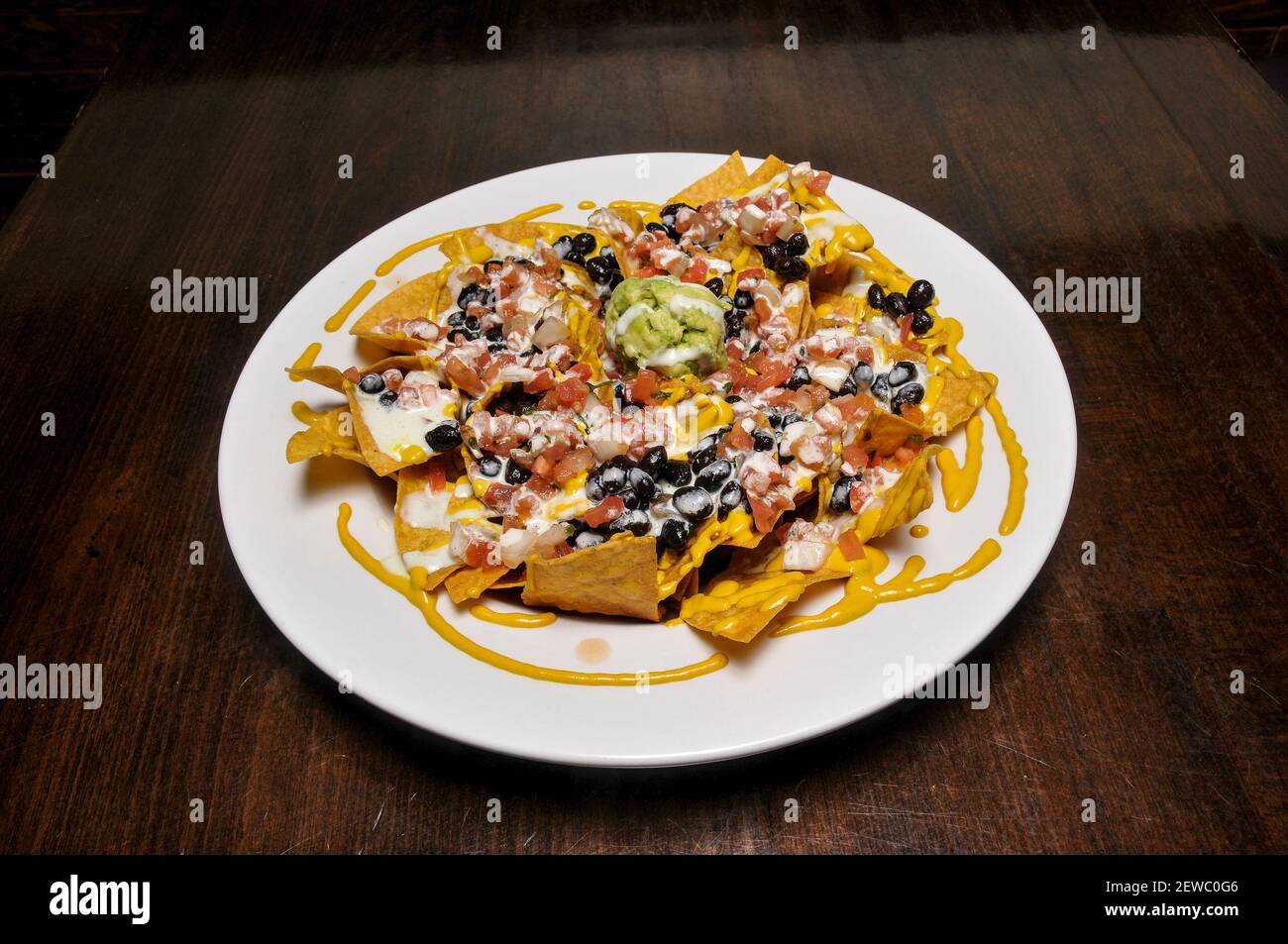 The Authentic Mexican cuisine known as nachos Stock Photo - Alamy