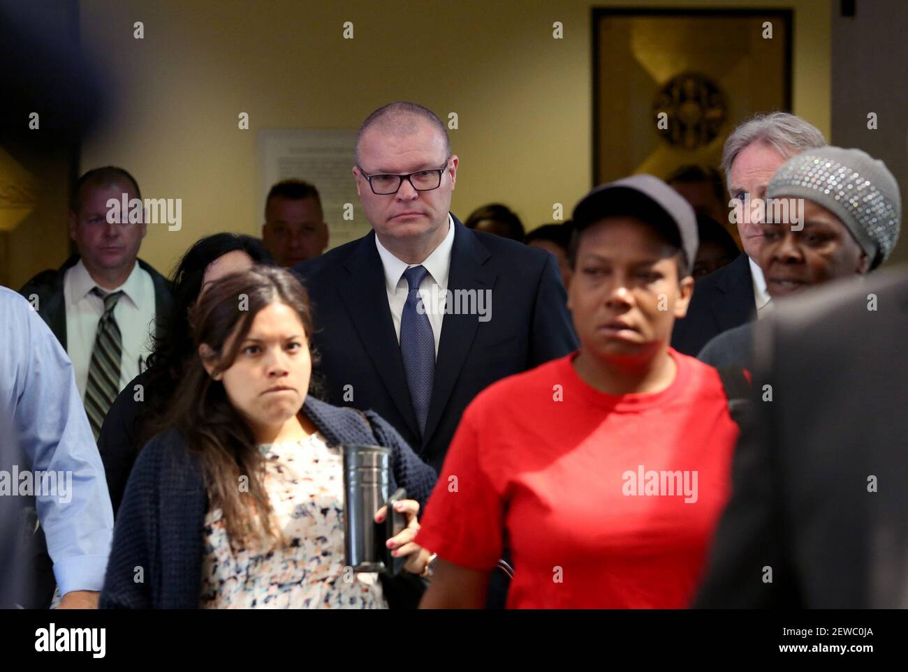 Former Chicago Police Officer David March, center, leaves the court to ...