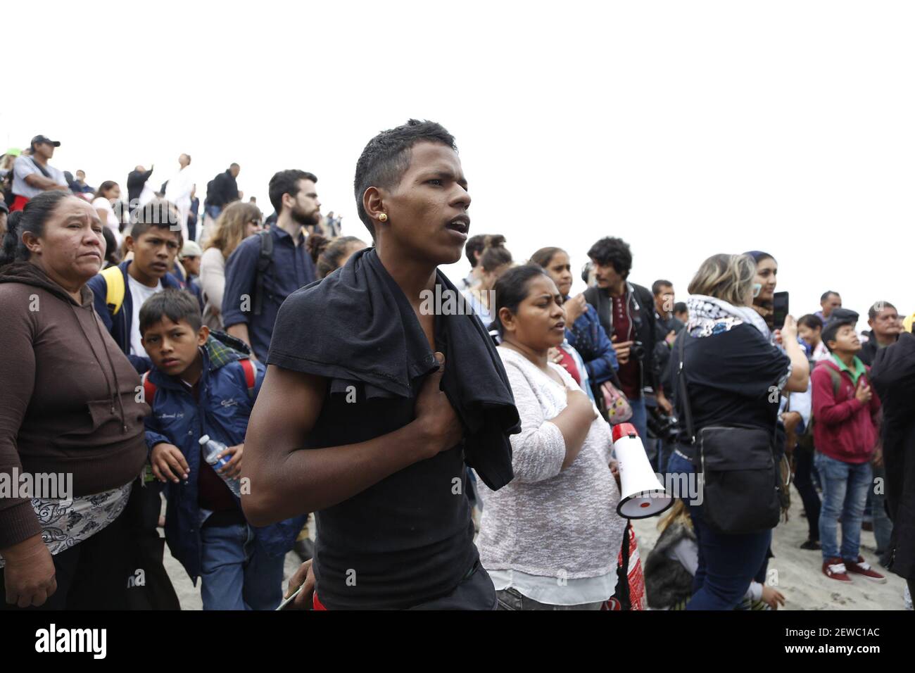 A Honduran man sings the Honduran national anthem in front of the ...