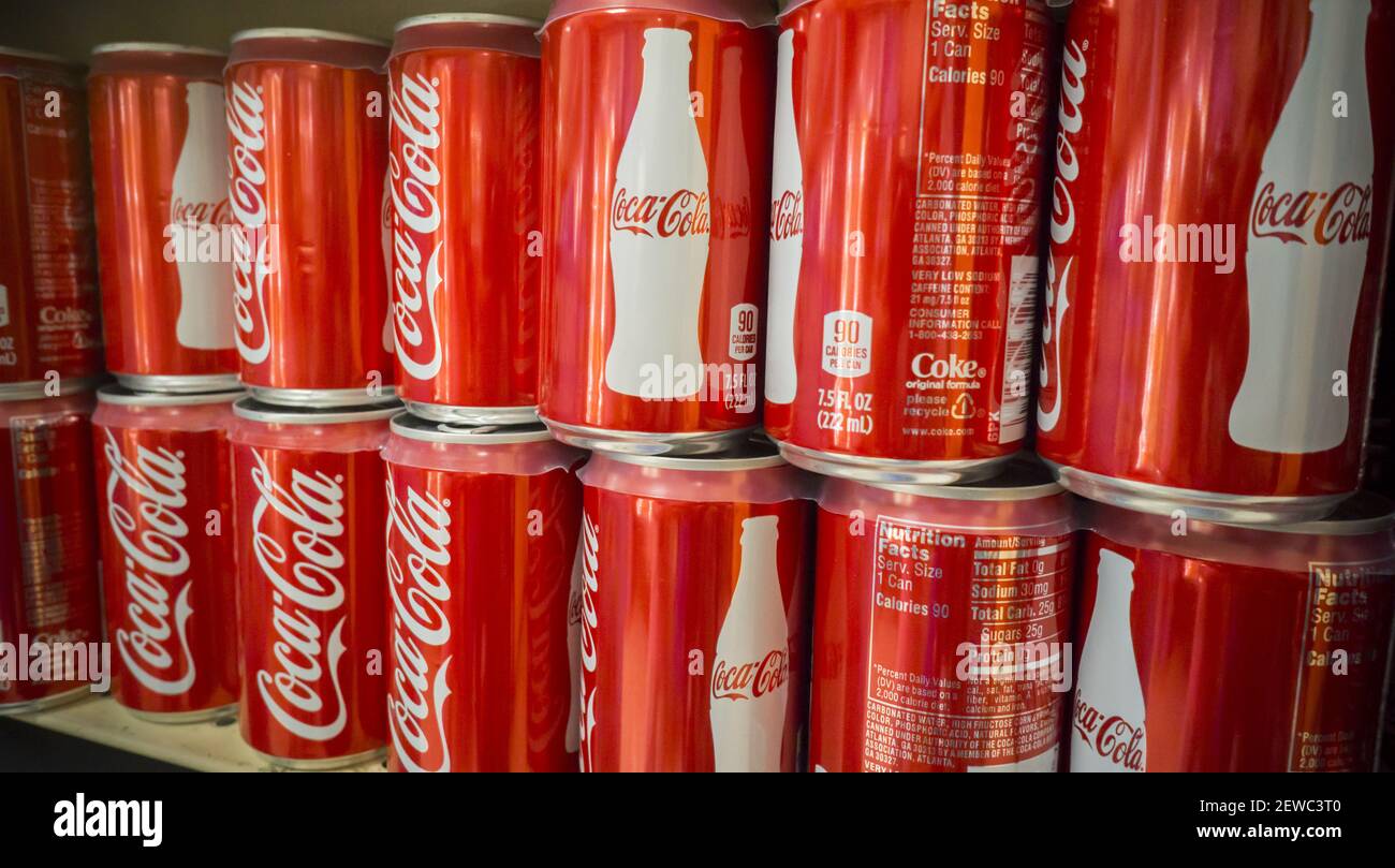 Six-packs of mini-cans of Coca-Cola in a supermarket in New York on ...