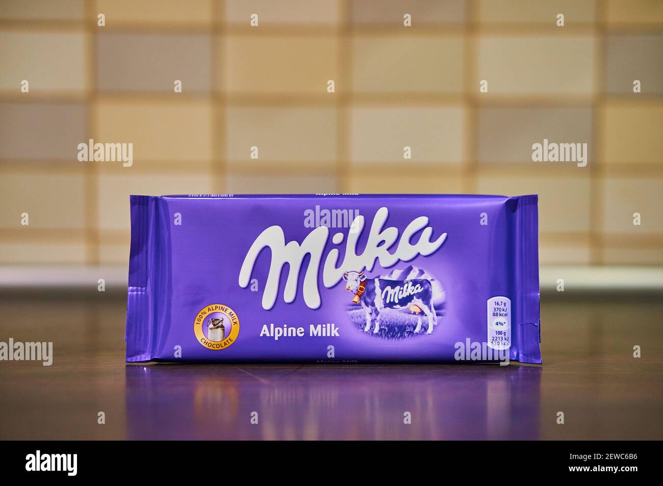 POZNAN, POLAND - Dec 01, 2017: Milka Alpine milk chocolate bar on a ...