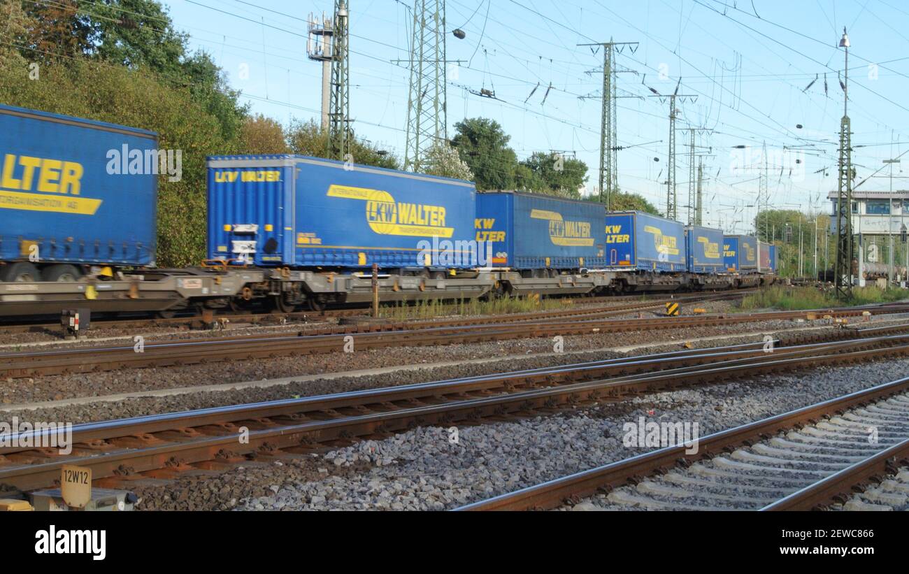 Lorry trailers being transported on railway goods wagons, Cologne ...