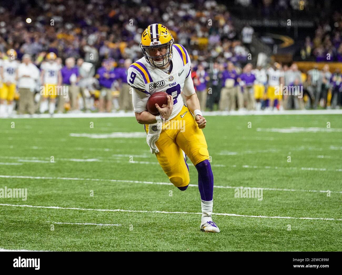 January 13, 2020: LSU quarterback Joe Burrow (9) runs for the endzone ...