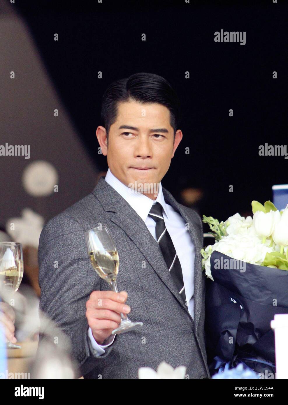 --FILE--Hong Kong singer, dancer and actor Aaron Kwok Fu-shing attends Shanghai Longines Global ...