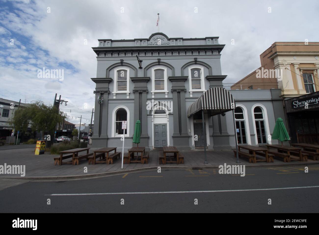 Historic Bank of New Zealand building on an overcast day in Hamilton ...