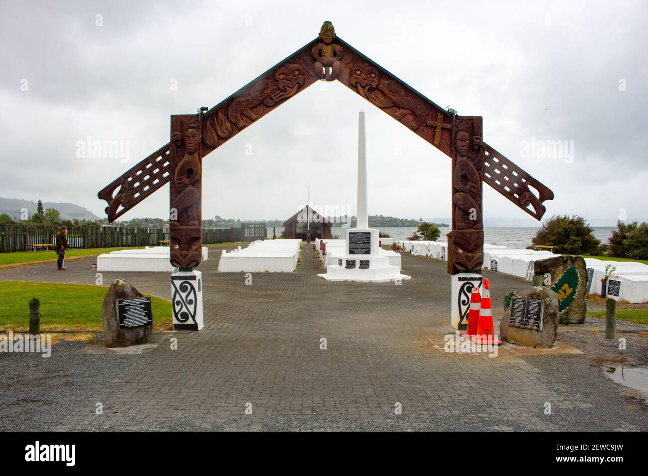 Maori wooden carvings gate entrance to the Second World War cemetery ...