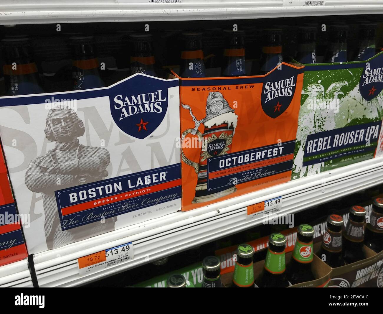 Six-packs of Samuel Adams beer are seen on a grocery store shelf in New ...