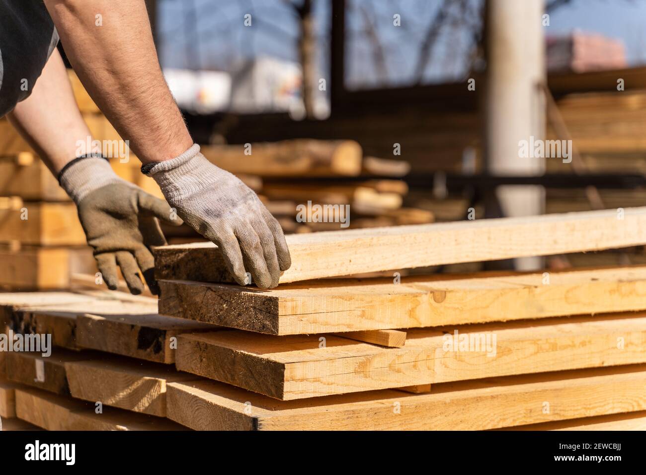 Close up on hands with working gloves of unknown caucasian man ...