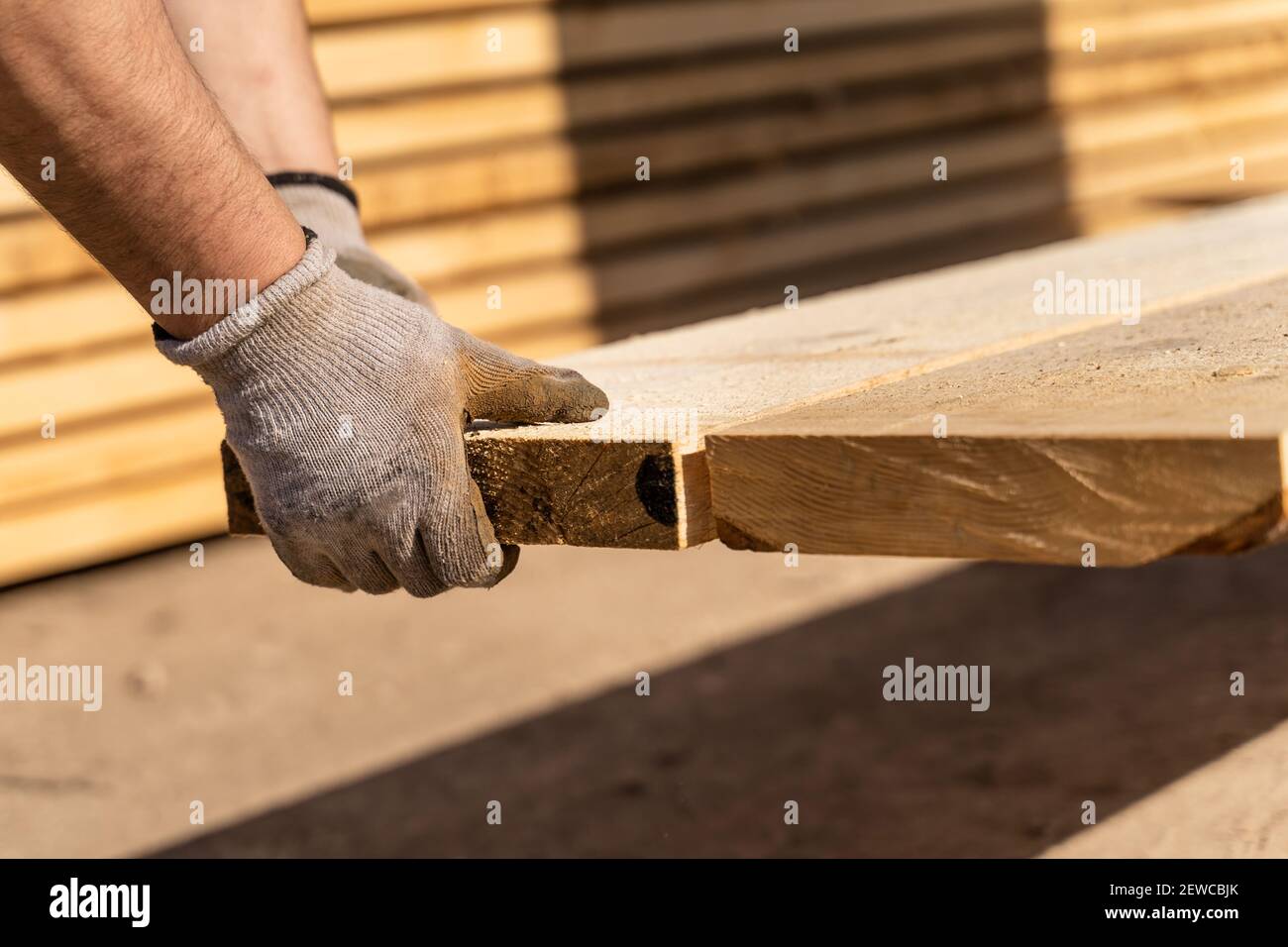 Close up on hands with working gloves of unknown caucasian man ...