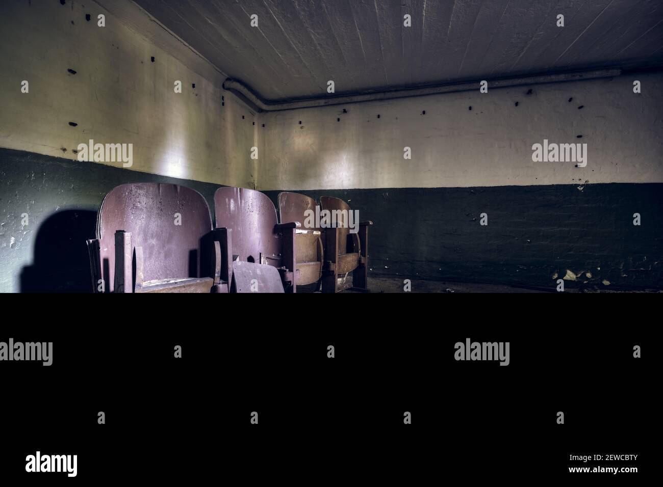 The old damaged theater seats in an abandoned ruined room Stock Photo ...