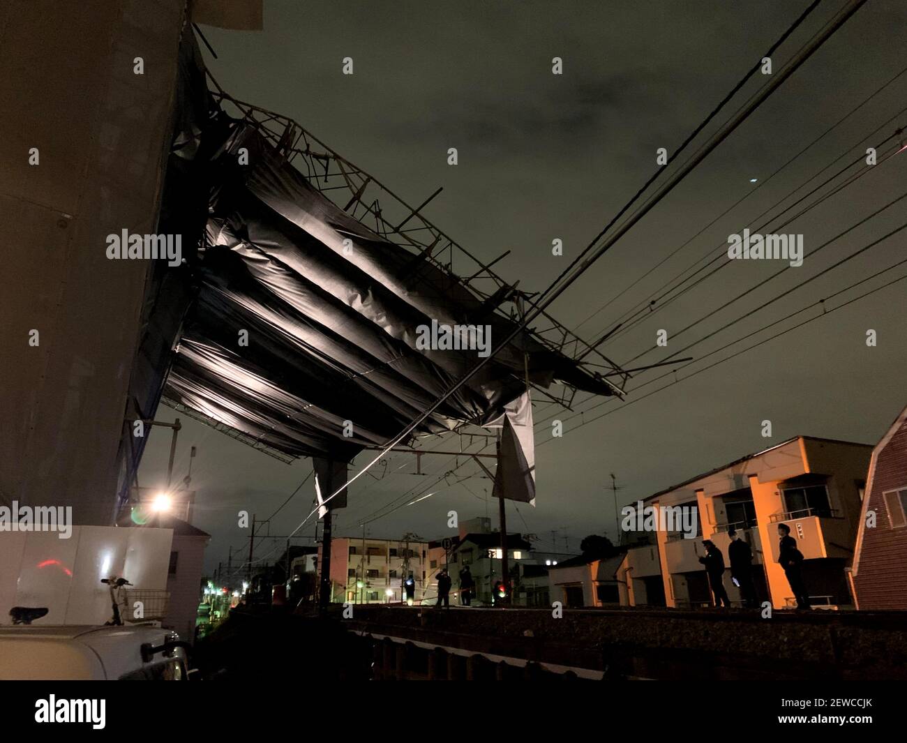 Tokyo, Japan. 2nd March, 2021. A scaffold collapse onto railway tracks ...