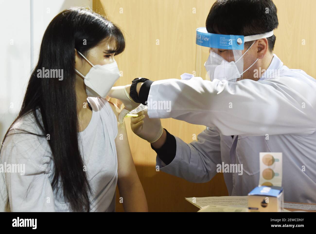 03rd Mar, 2021. COVID-19 vaccinations A medical worker gets a Pfizer ...