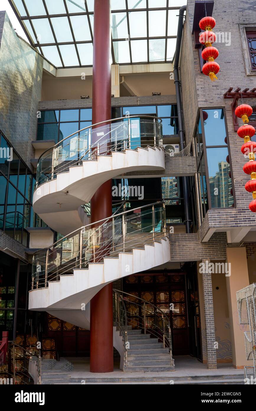 Cylindrical spiral staircase outside the building Stock Photo - Alamy