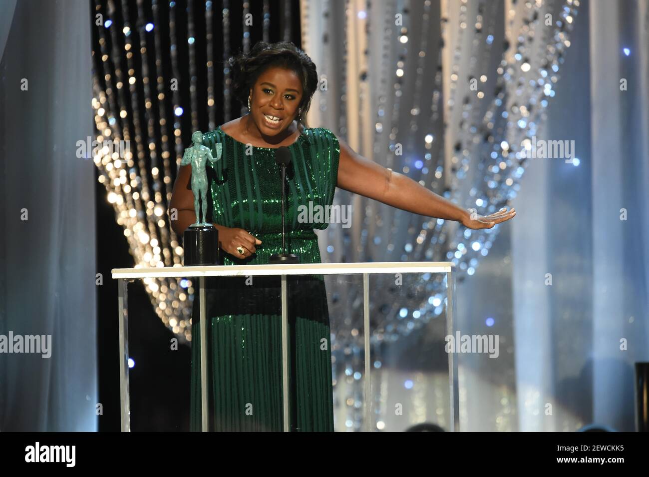Uzo Aduba accepts the award for outstanding female actor in a comedy ...