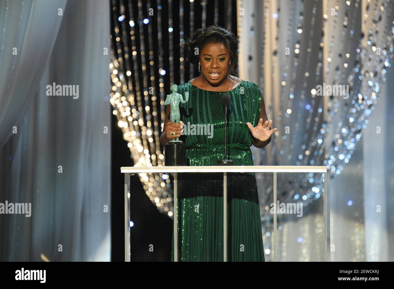 Uzo Aduba accepts the award for outstanding female actor in a comedy ...