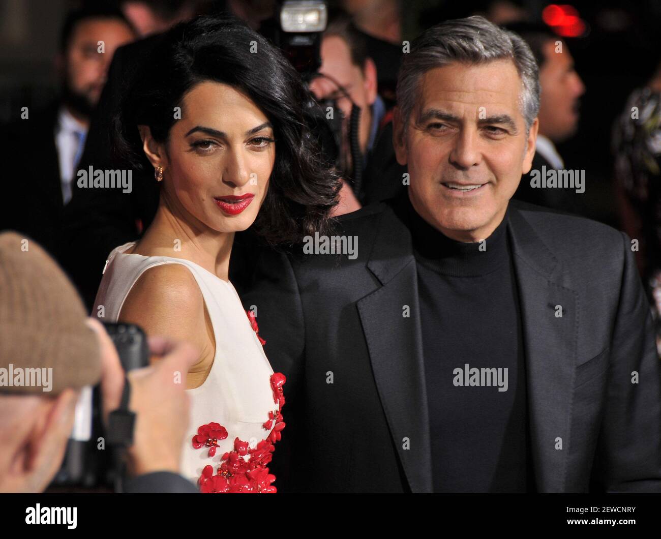 (L-R) Amal Clooney and George Clooney arrives at the "Hail, Caesar ...