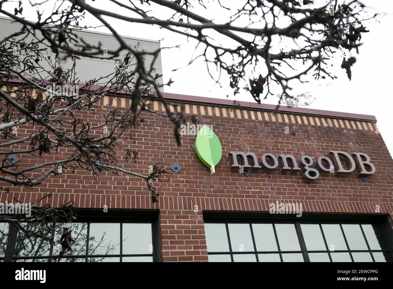 A logo sign outside of the headquarters of MongoDB in Palo Alto ...