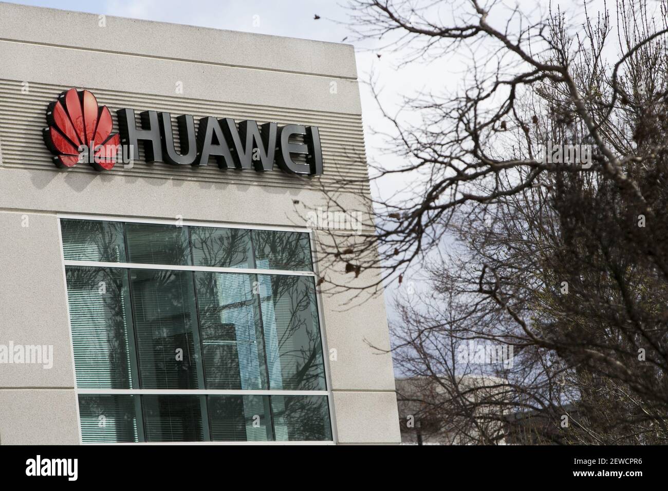 A logo sign outside of a facility occupied by Huawei in Santa Clara ...