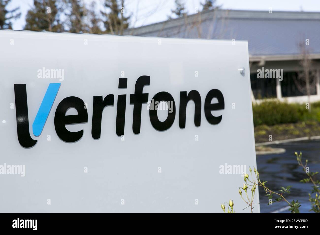 A logo sign outside of the headquarters of Verifone in San Jose ...