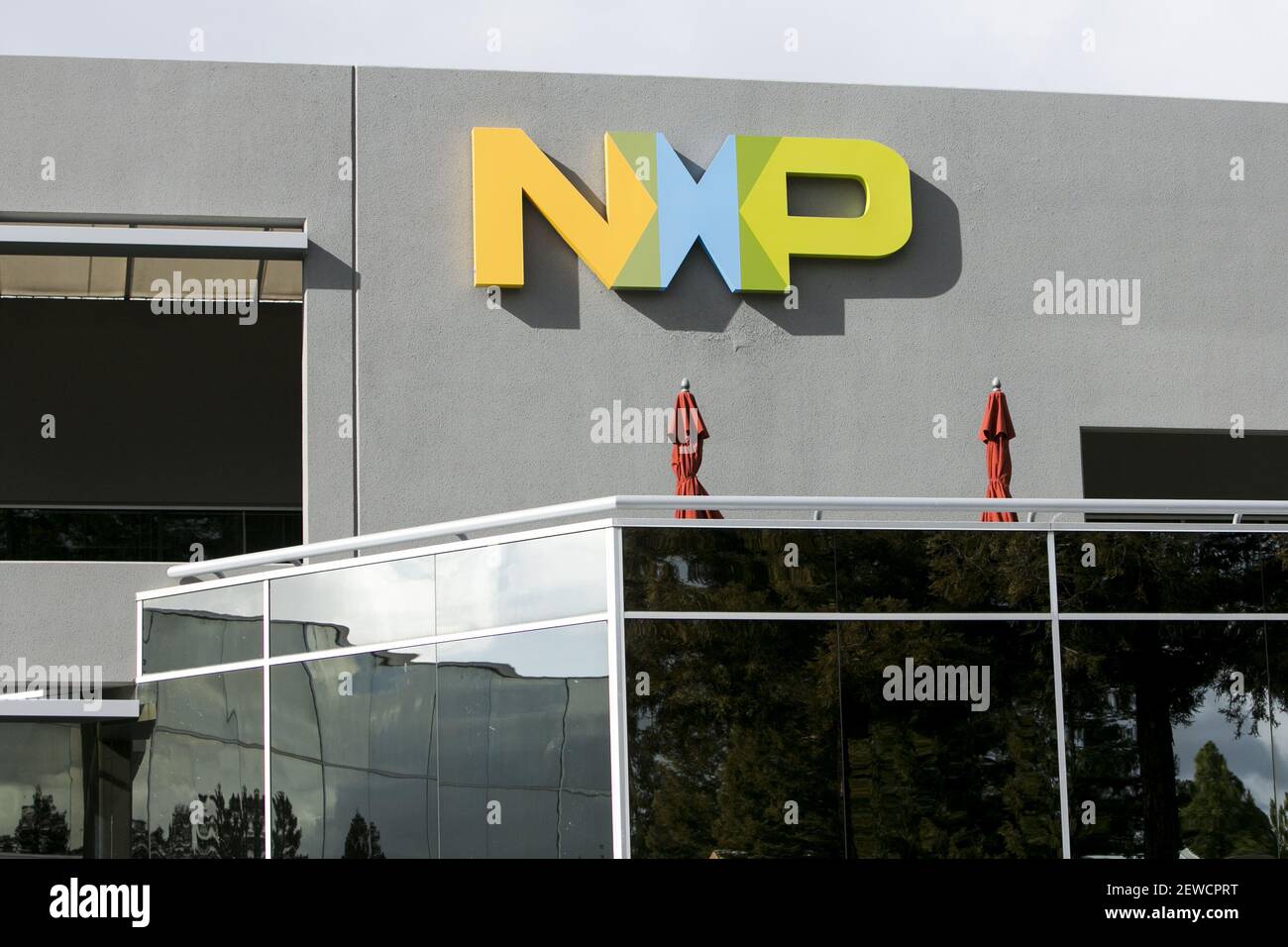 A logo sign outside of a facility occupied by NXP Semiconductors in San ...